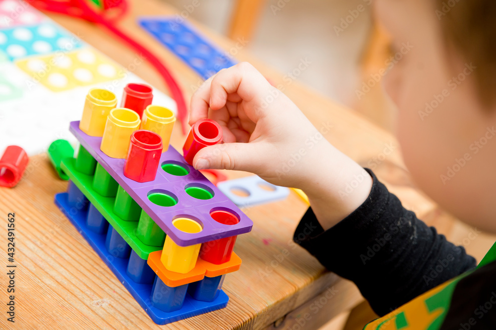 Kids hand on figures. Learning to count through the game. Tool to easy ...