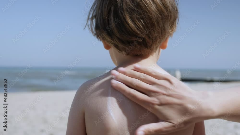 Mother Applying Sunblock Cream on Kid. Mom Applying Sunscreen Lotion on ...