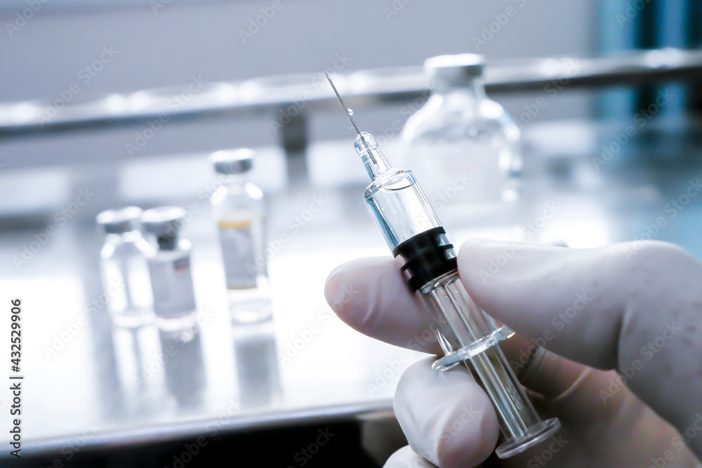 Trial vaccine coronavirus deverlopment vial dose flu shot drug needle ...