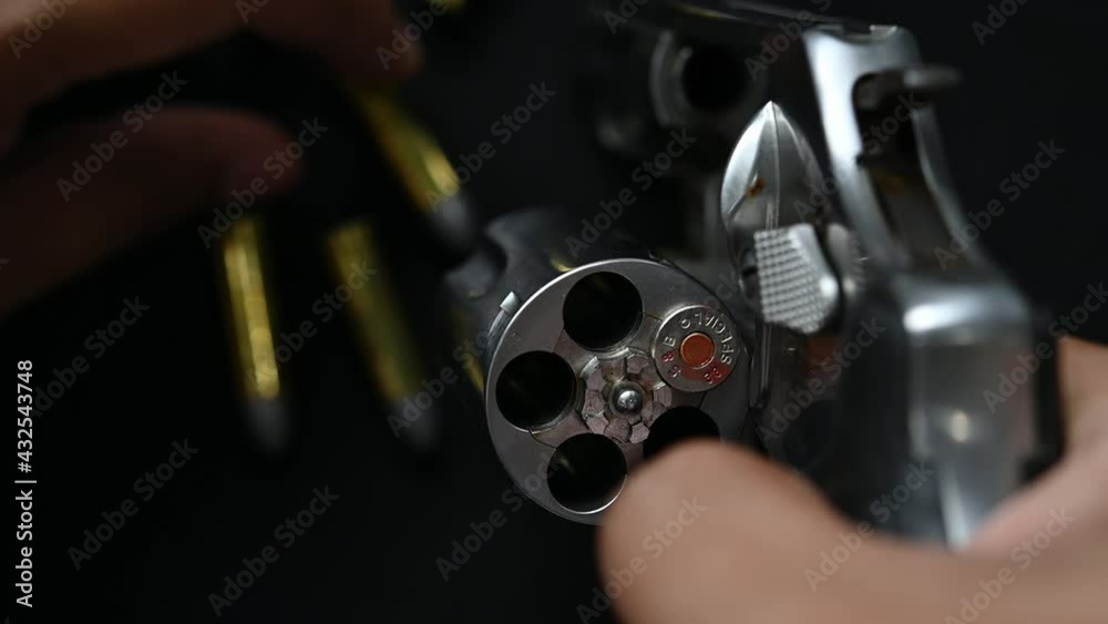 Reloading bullet,The compact revolver gun, Revolver Pistol on black ...