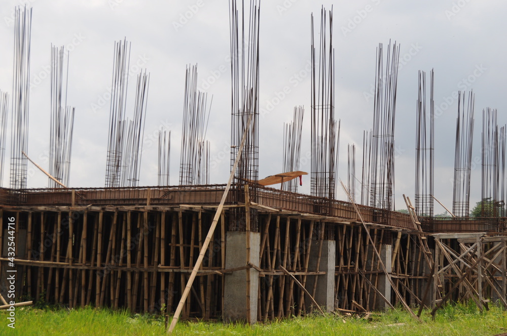 the process of building a building or a residence in the middle of rice ...