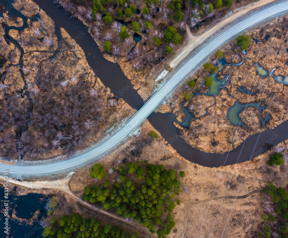 intersection of a road and a river in the form of an infinity sign ...