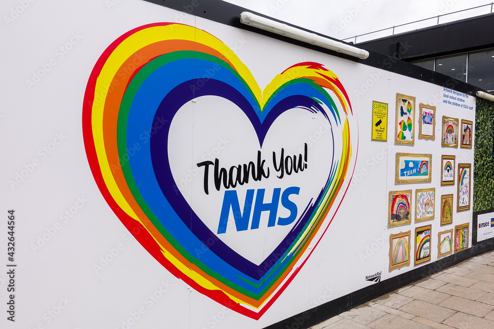 London, UK, May 8th 2021: At Euston station, a large poster banner wall ...