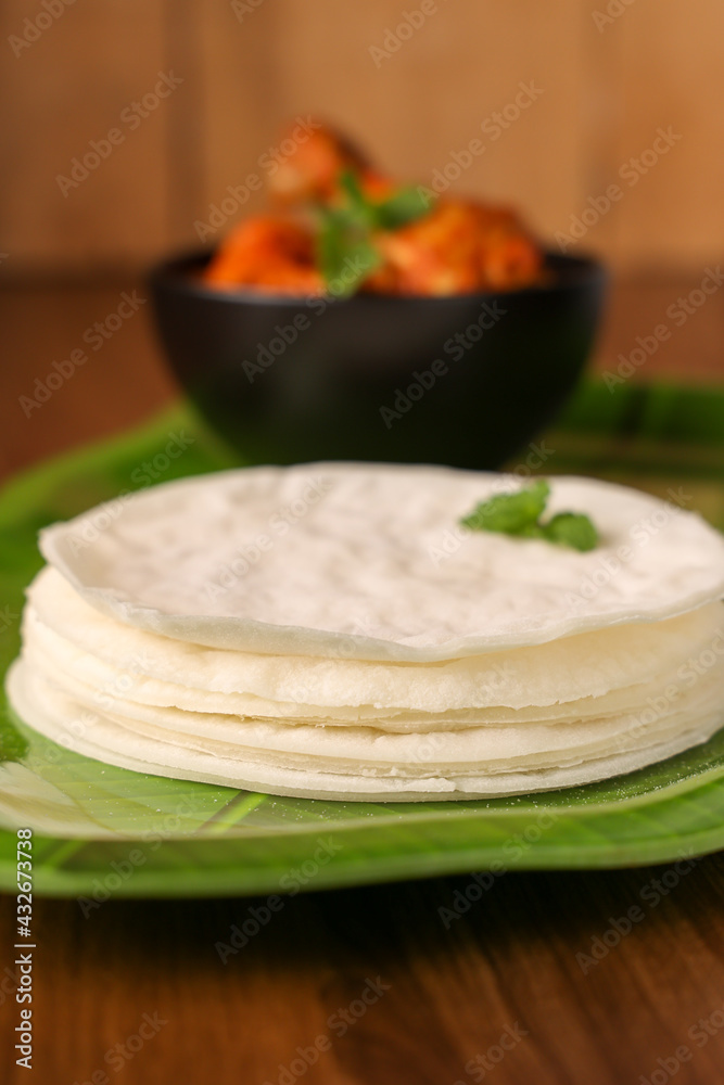 Rice pathiri Pathir flat bread with spicy chicken curry, Kerala Tamil ...