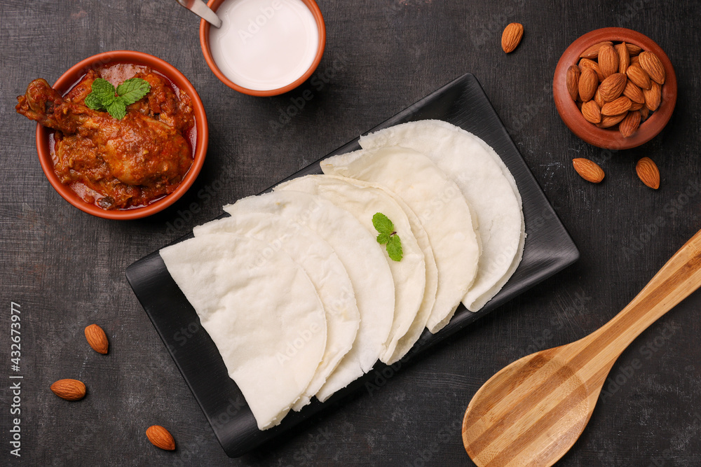 Rice Pathiri , pathir flat bread with spicy chicken curry, coconut milk ...