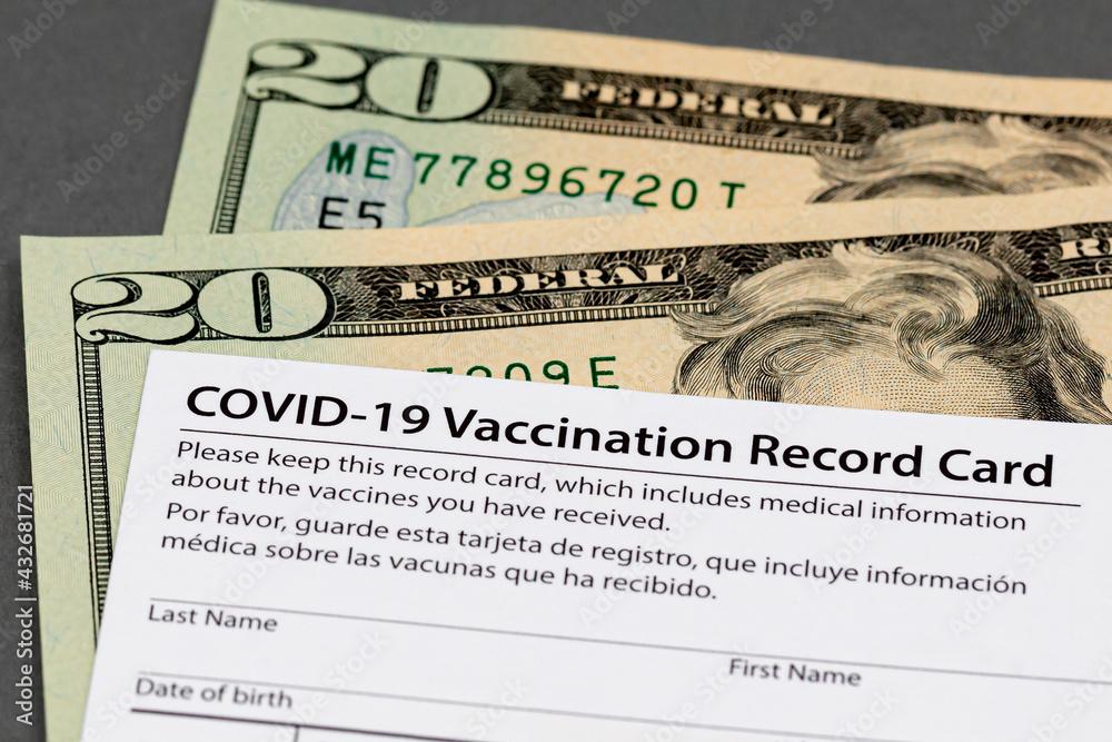 Covid-19 vaccination record card and cash money. Fake, vaccine card ...