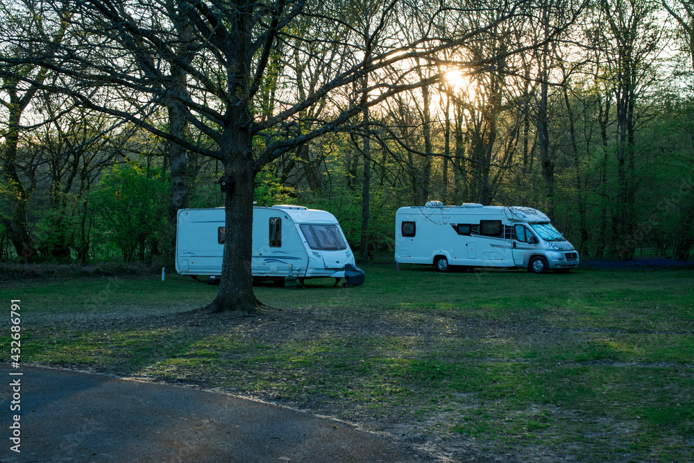 Motorhome campers parked in a camp in early spring Stock Photo | Adobe ...