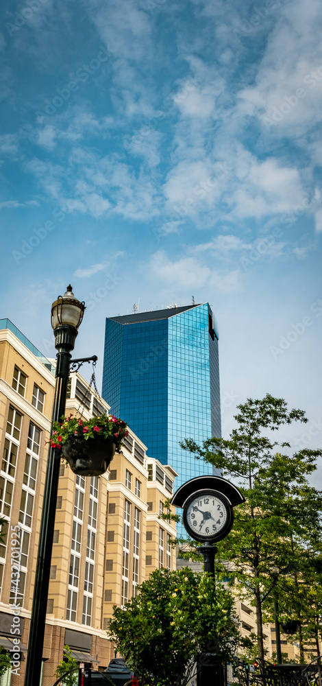 Building facades, lamp post and a clock on Main Street in downtown ...