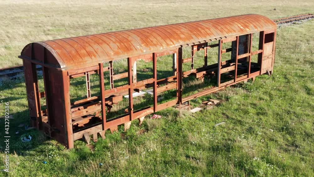 Old rusty freight car- covered railway wagon for transportation of ...