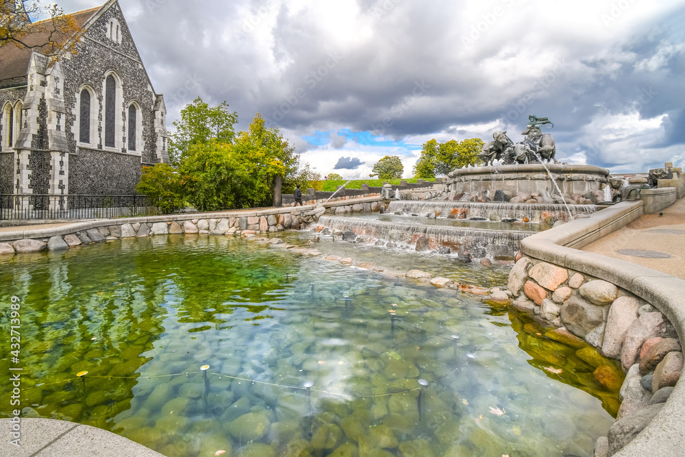The Gefion Fountain featuring a large scale group of oxen driven by the ...