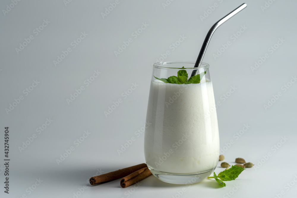 lassi, lassie - indian yogurt drink with spice on white background ...