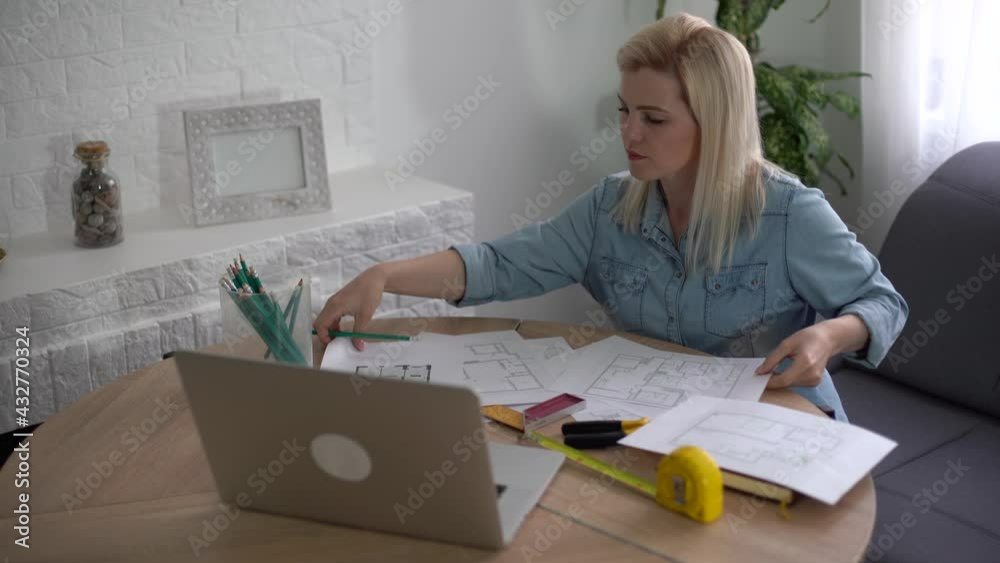 Architect working on blueprint. Architects workplace - architectural ...