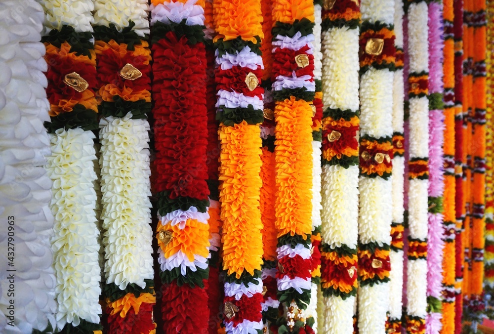 Colorful handcrafted floral garlands for sale as prayer offerings ...