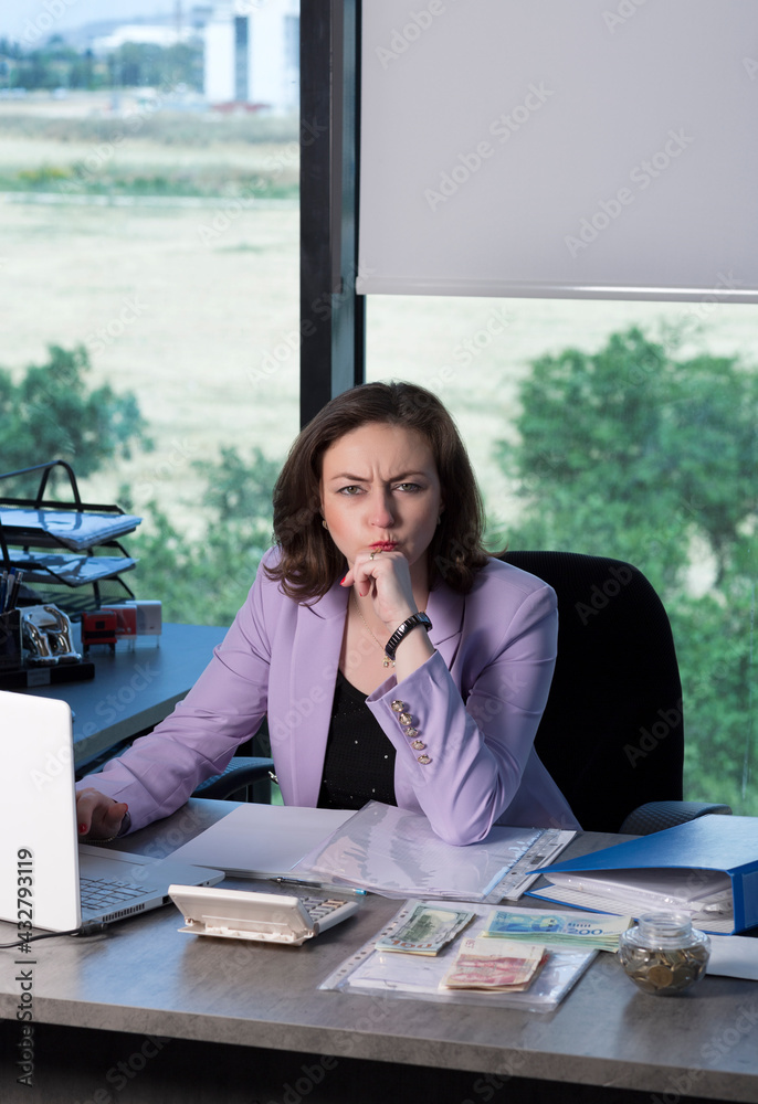 Sceptical business Woman is unsure what to do. She has focused grimace ...