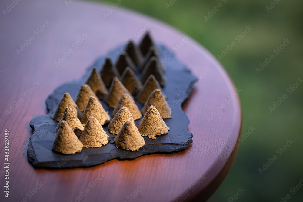 Some hand-made conical moxa used in traditional Chinese medicine is ...