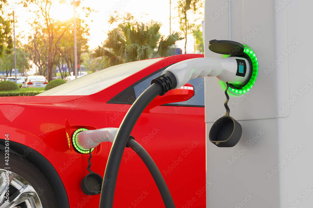 ภาพประกอบสต็อก Electric vehicle power plugged charging at station with ...