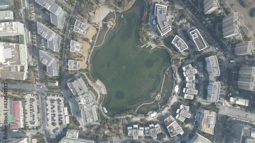 Aerial view of office buildings and lake in Zhangjiang Shanghai China ...