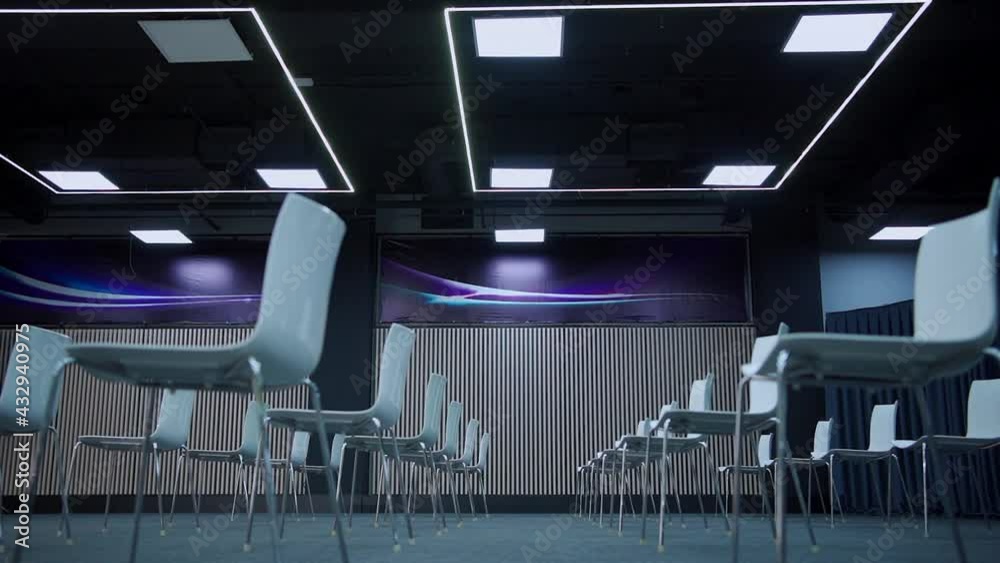 empty modern conference hall with preventive distance between seats, no ...