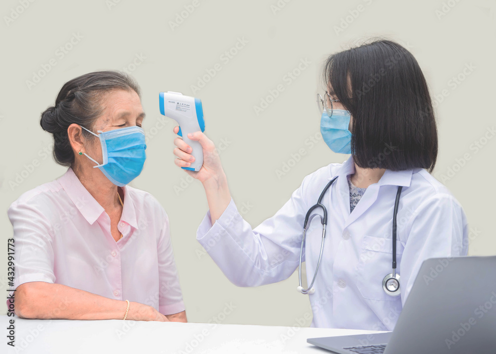 Female doctor in hospital use thermometer to check temperature to ...
