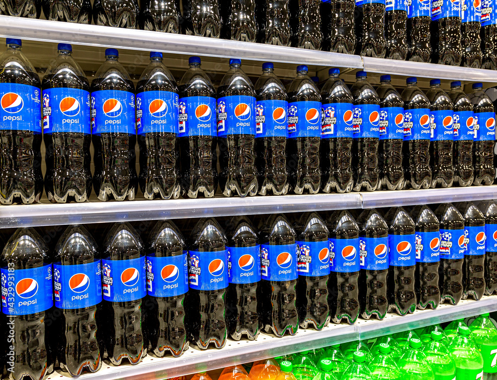 Bottles of Pepsi Cola on store shelf Stock Photo | Adobe Stock