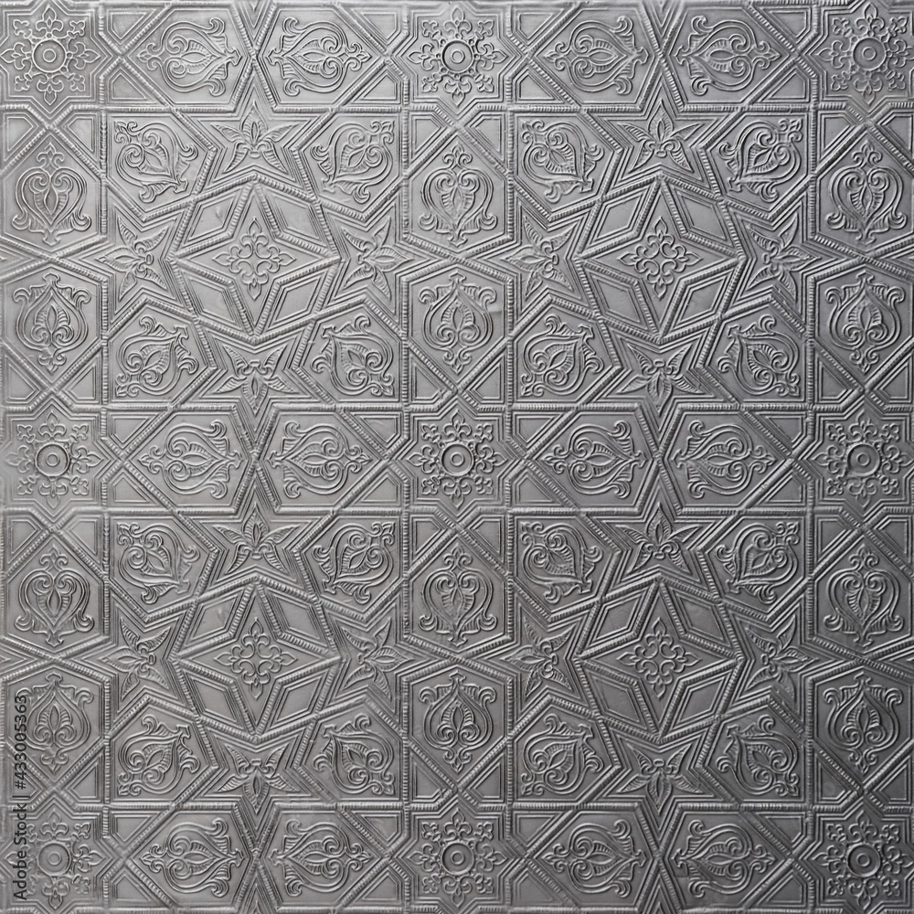 Traditional islamic rhythmic arabesque pattern in form of embossing on ...