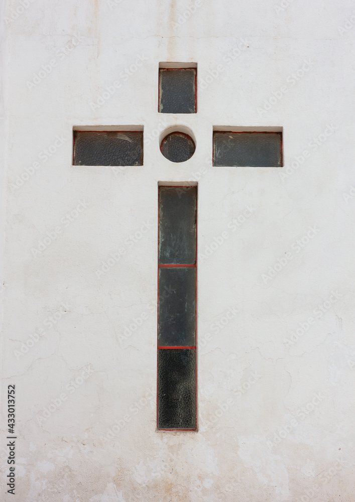 Window in a christian cross shape on se catedral do huambo, Huambo ...