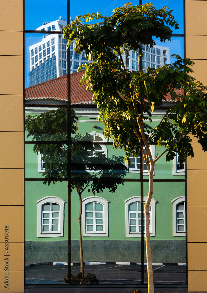 Reflection of an old portuguese colonial building, Luanda Province ...