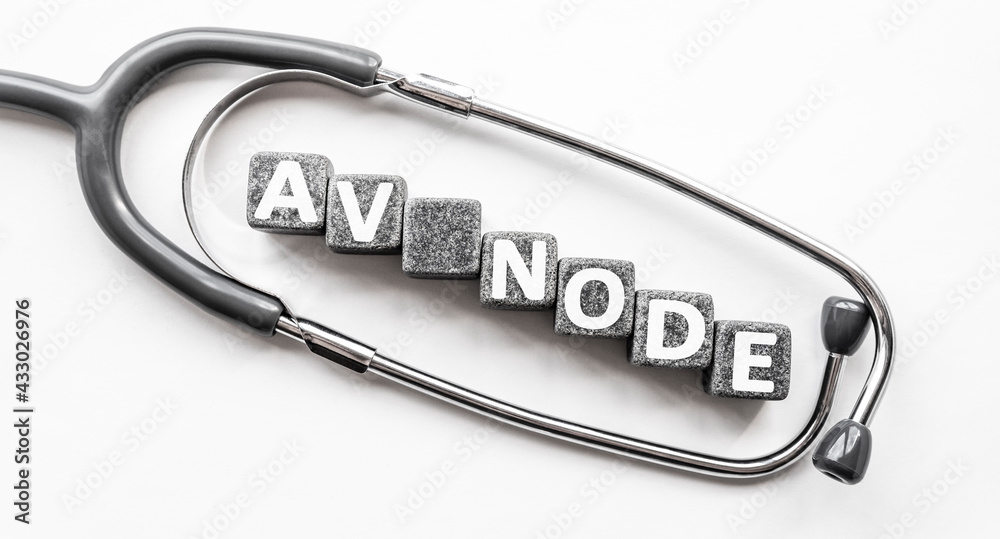 Stone block form word AV NODE with stethoscope. White background. Medical concept ...