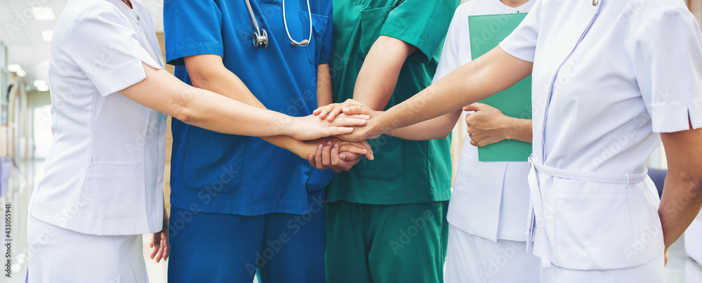 Cooperation of people in the medical community teamwork with a hands ...