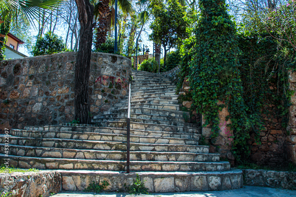 Park landscape. A stone-paved staircase in the park. Spring landscape ...