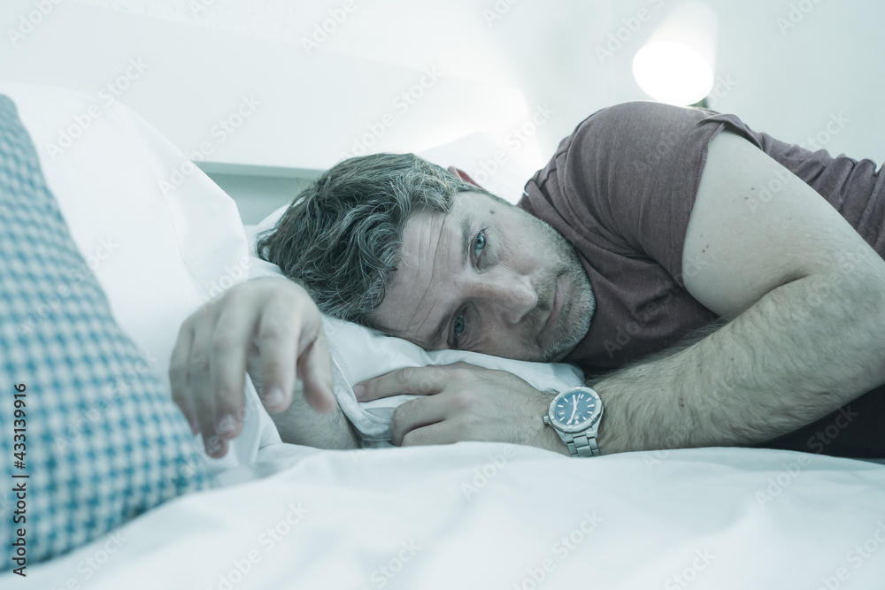 Man suffering depression - dramatic portrait at home of sad and ...