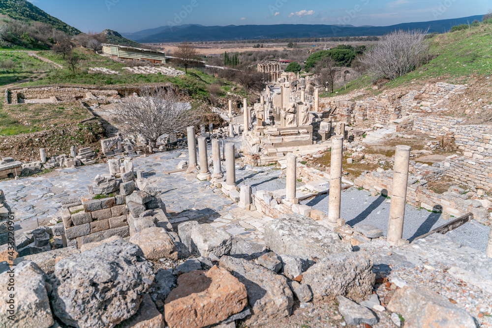 Celsus Library in Ephesus in Selcuk (Izmir), Turkey. Marble statue is ...