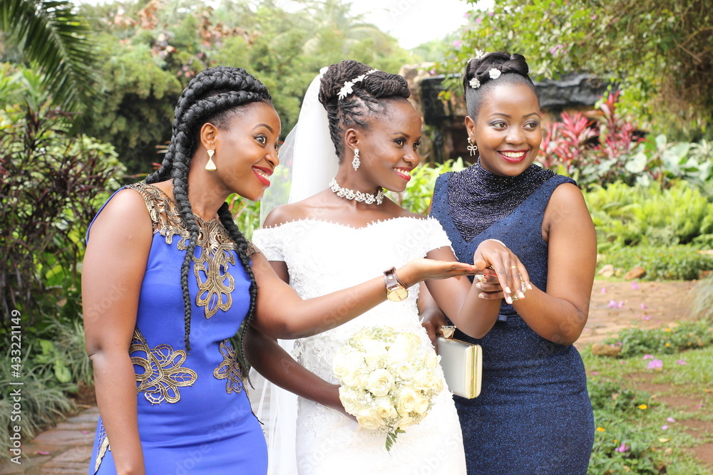 The Bride and the bride maids on the wedding day having fun in the ...