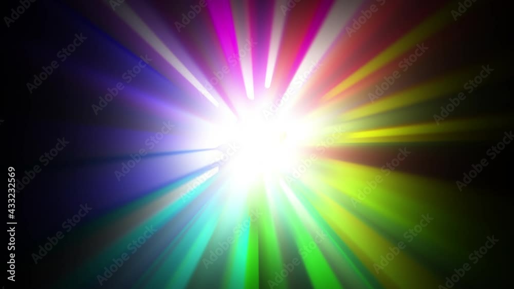 A quick, loopable animation of a blur of color and light rays, bursting ...