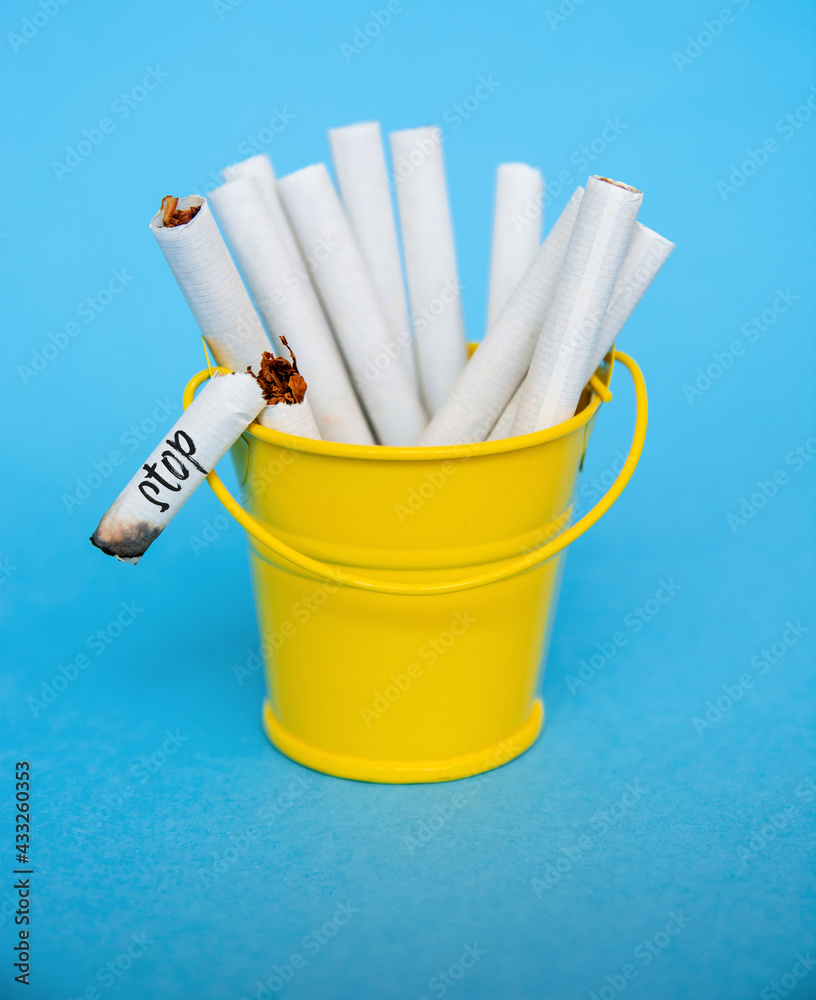 cigarettes in trash can, quit smoking - World No Tobacco Day infocard ...