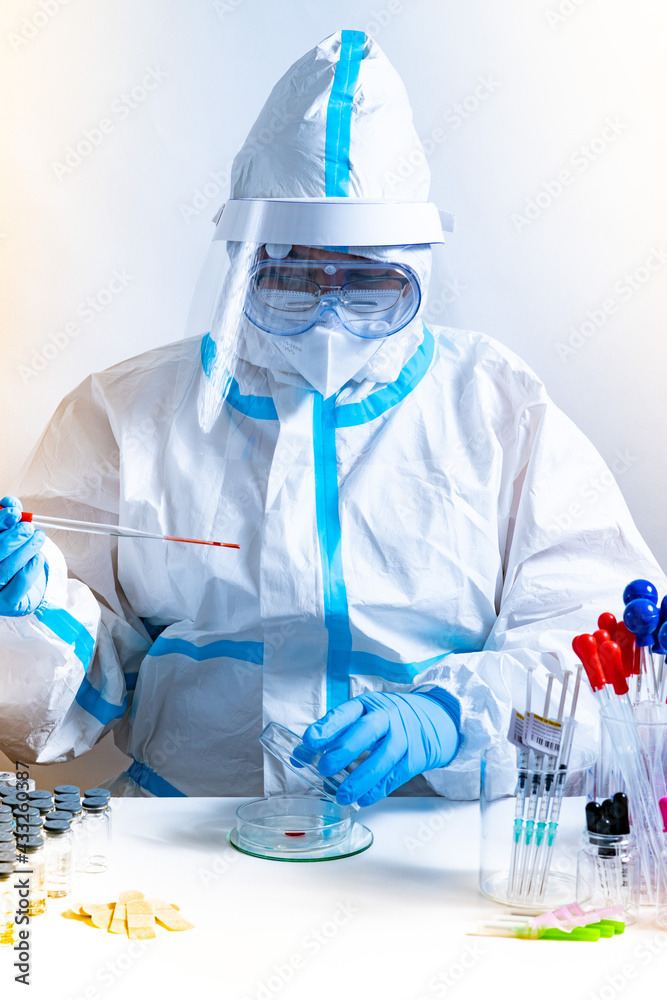 Female scientist work in medical virology laboratory and developing a ...
