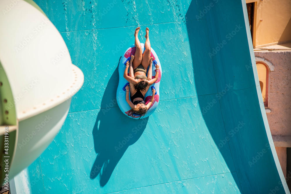 Two Cute Teenage Girls In Water Park Fun On The Water Teen Girl And