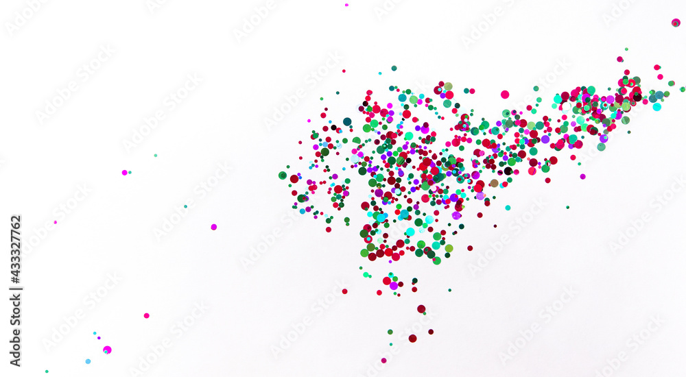 White background with multicolored glitter. Party background with ...