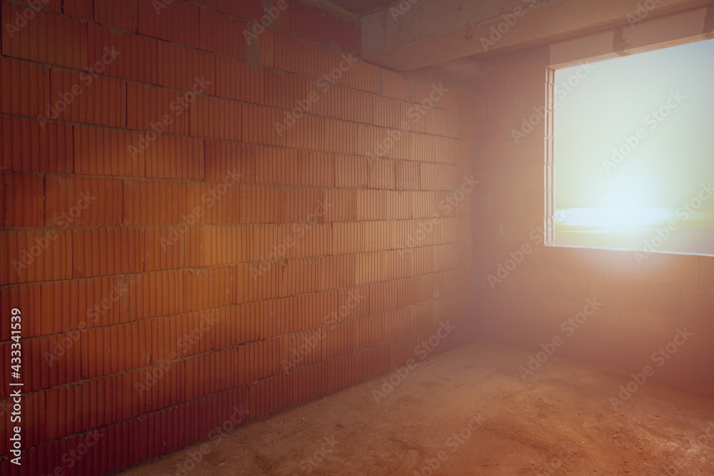 room in a building under construction. Multi-storey residential ...