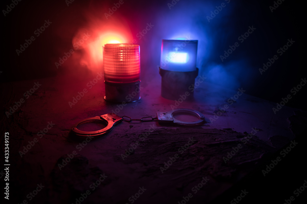 Police raid at night and you are under arrest concept. Silhouette of ...
