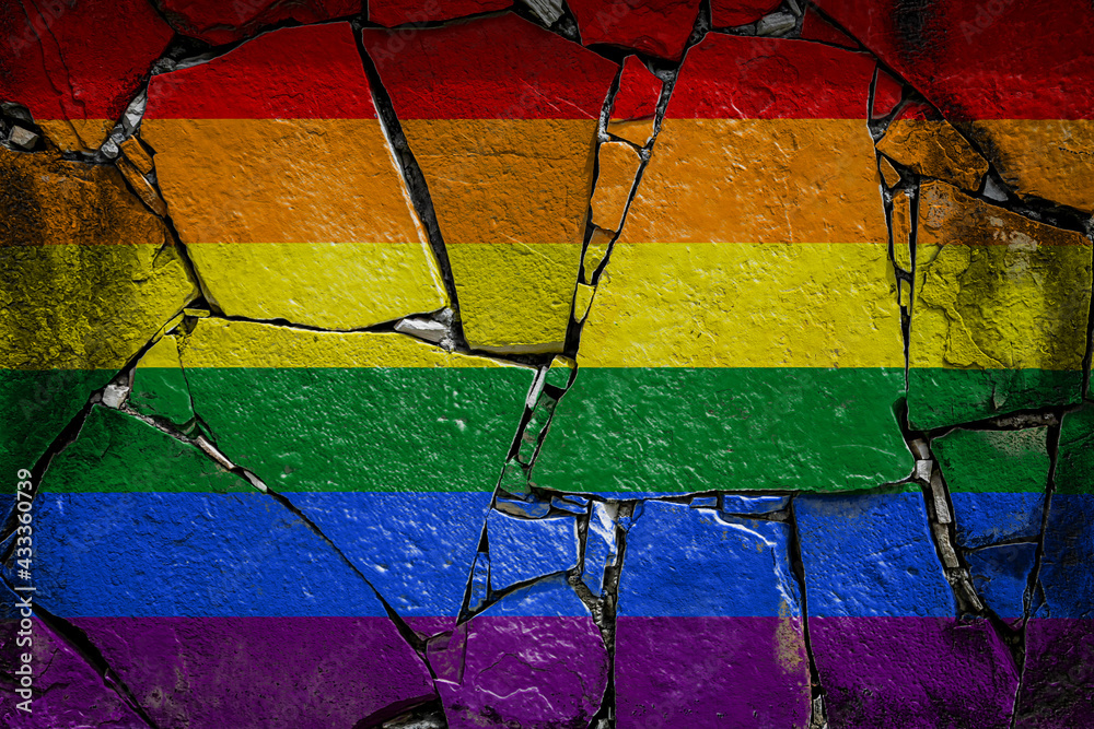 Flag of LGBT depicting in paint colors on an old stone wall. Flag ...