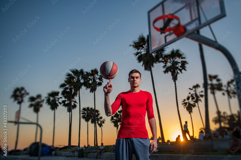 Basketball player shooting ball in hoop outdoor court. Urban youth game ...
