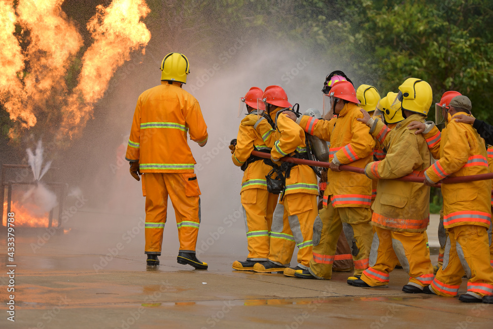 Practice extinguishing the fire Firefighter are using water in fire ...