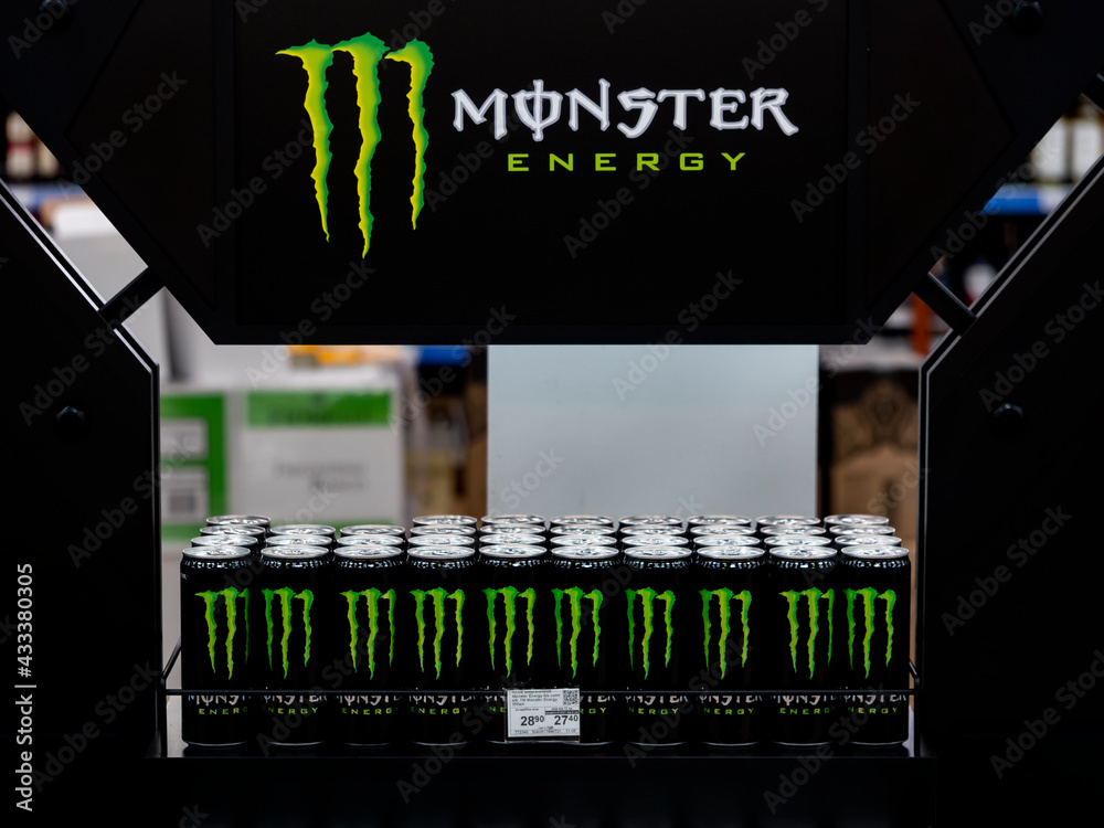 Monster Energy drink on store shelf. Stock Photo | Adobe Stock