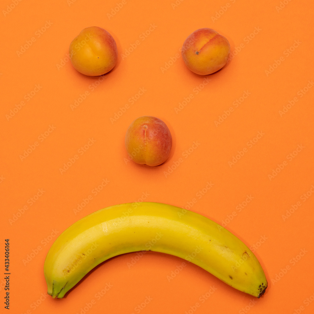 Still life stock photo of ripe yellow banana and fresh peaches forming ...