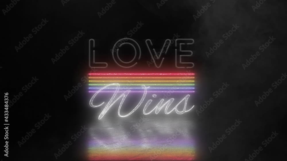 Vidéo Stock Love wins neon rainbow text with smoke or fog effect.Love ...