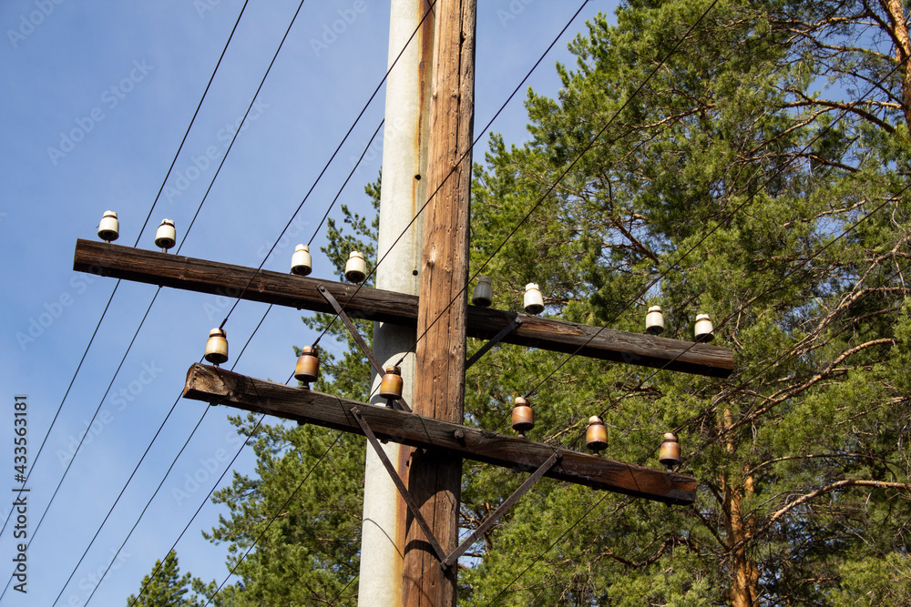 Supports power lines. Old supports and insulators on the transmission ...