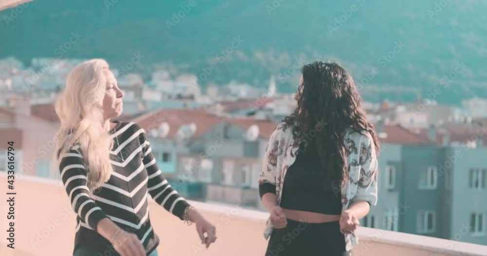 Mother and daughter dancing in a party. Healthy children and mommy ...