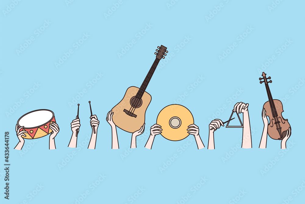 Musical instruments and creative arts concept. Human hands holding ...