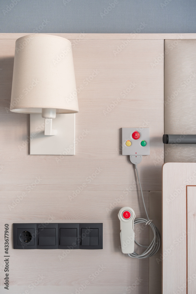 Nurse call system with emergency buttons installed near bed in medical ...
